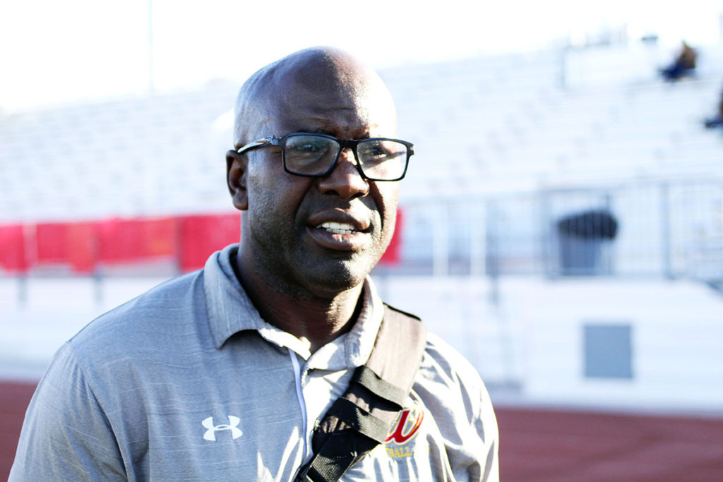 New Woodbridge football coach Aaron Craver gets ready for first game vs ...