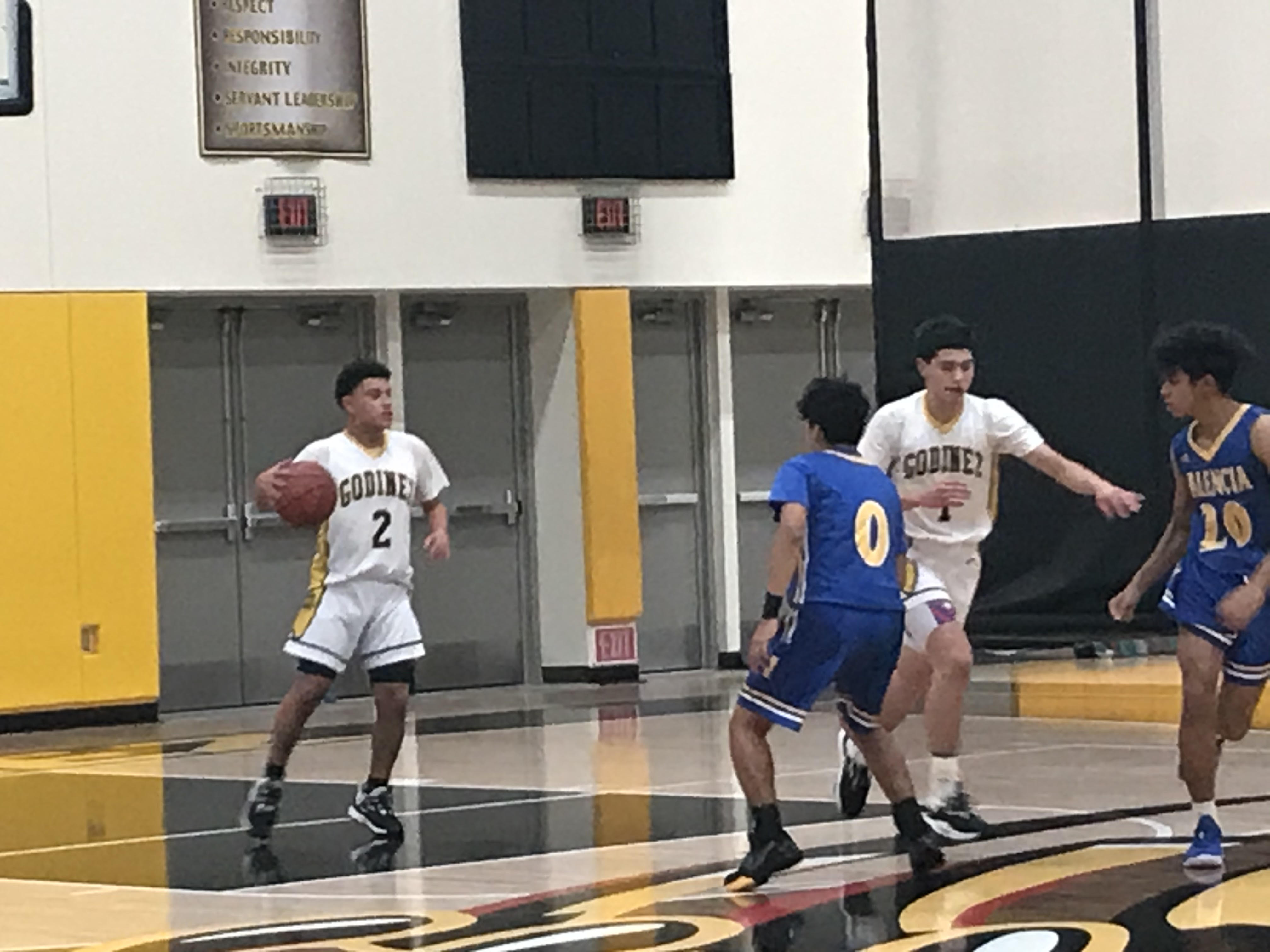PHOTOS: Valencia off to 10-1 start after defeating Godinez 50-38 in ...