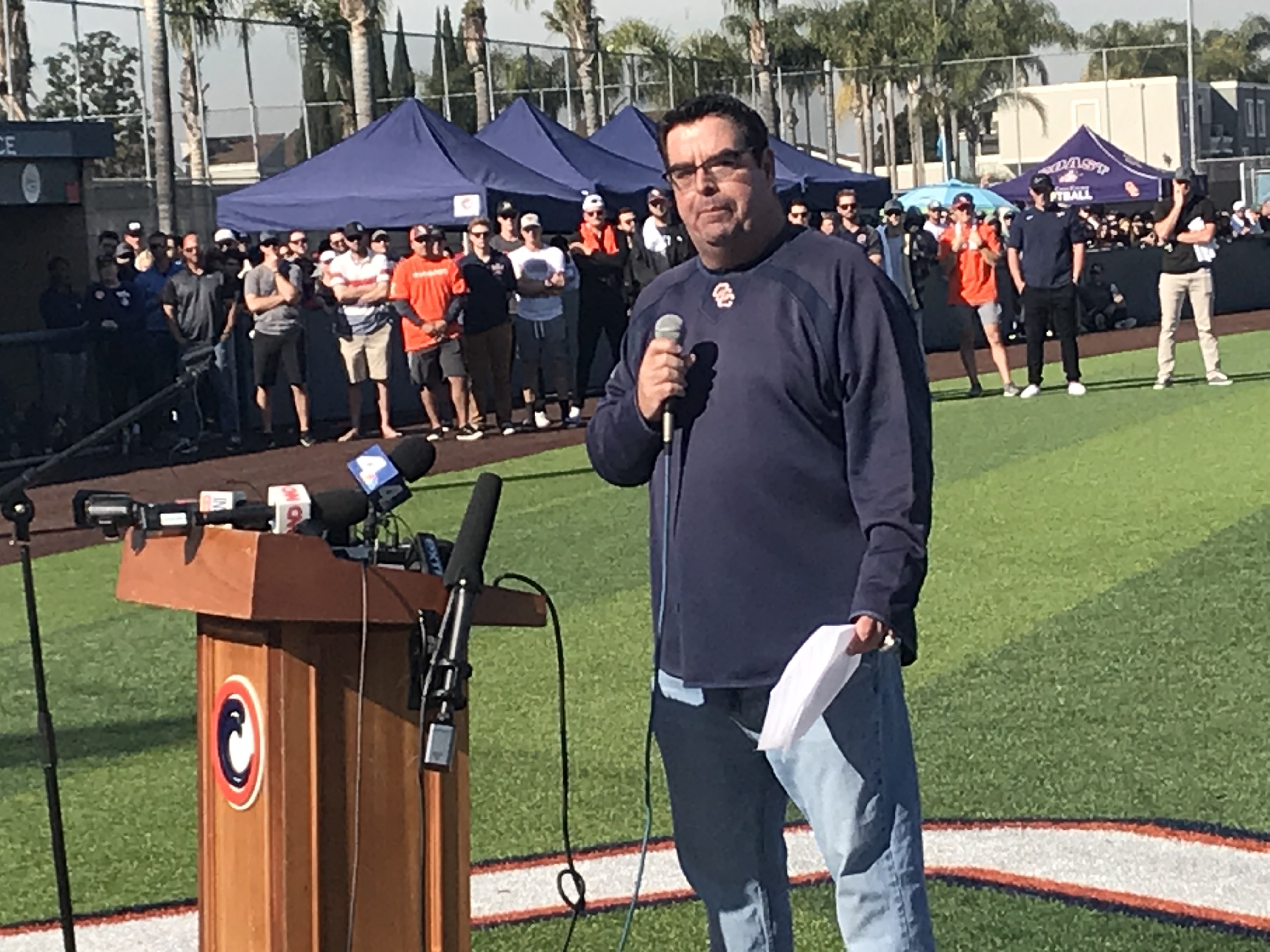 PHOTOS: Thousands pack OCC stadium on opening day and honor Coach John ...