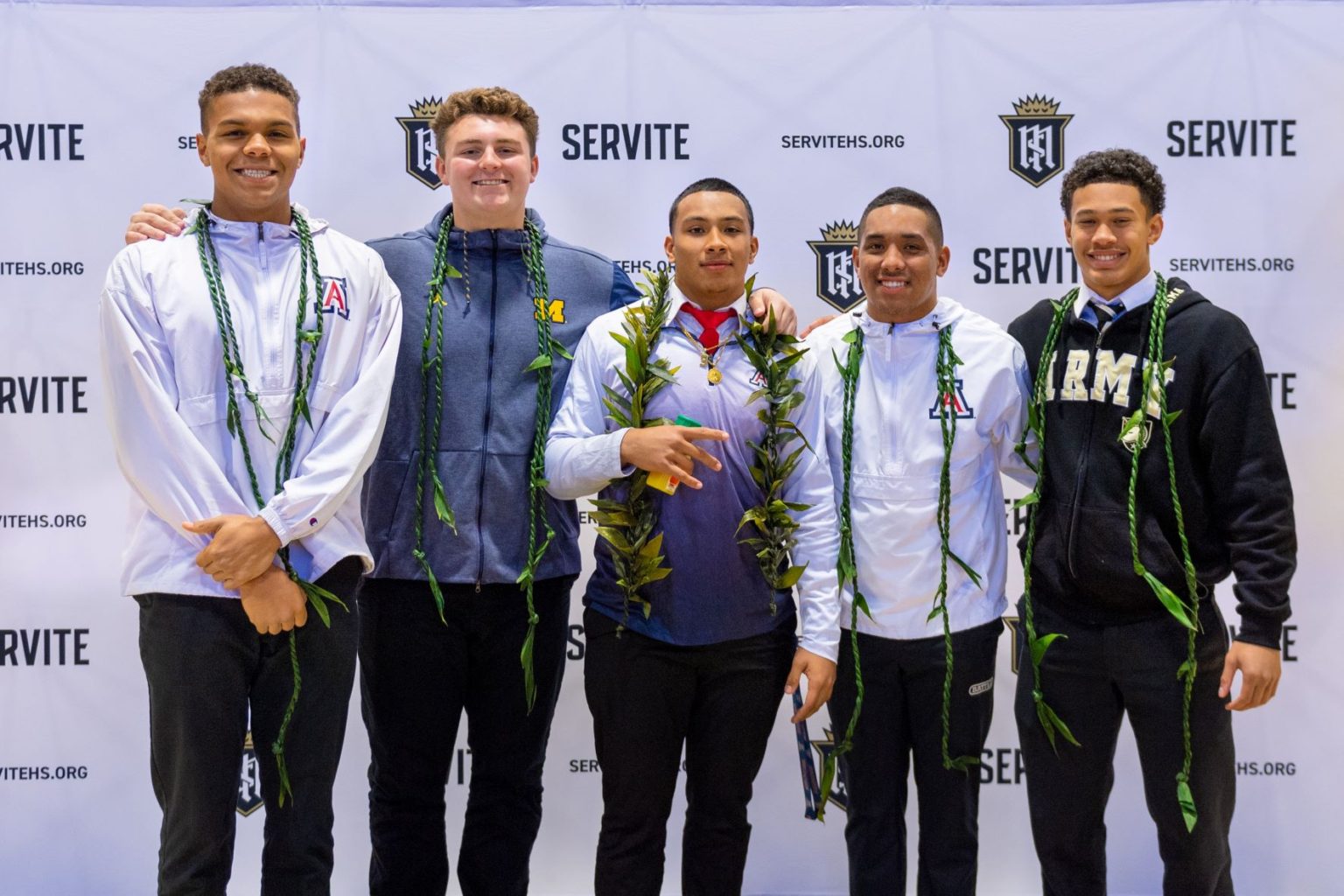 Five Servite football players sign national letters of intent